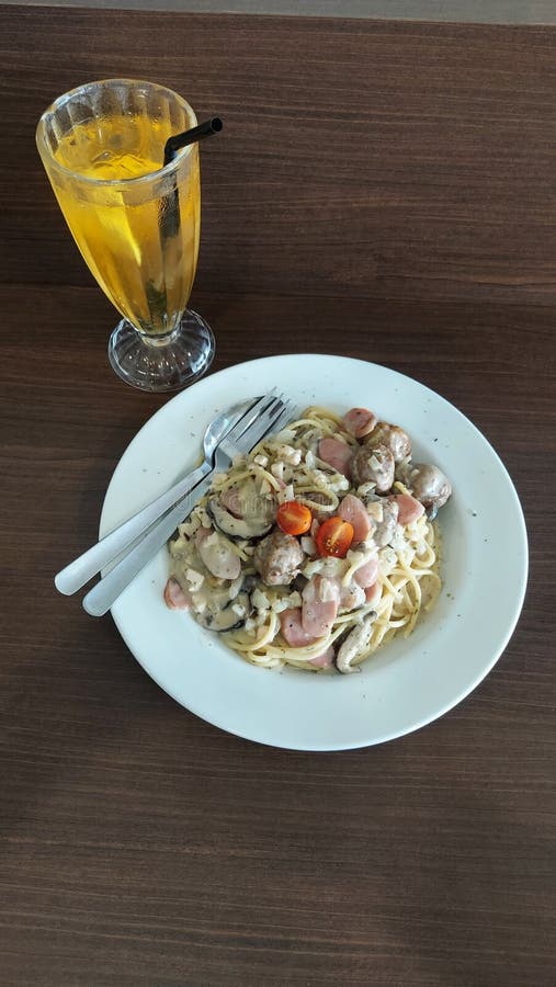 Creamy Spaghetti Carbonara with Ice Drink Stock Photo - Image of creamy ...