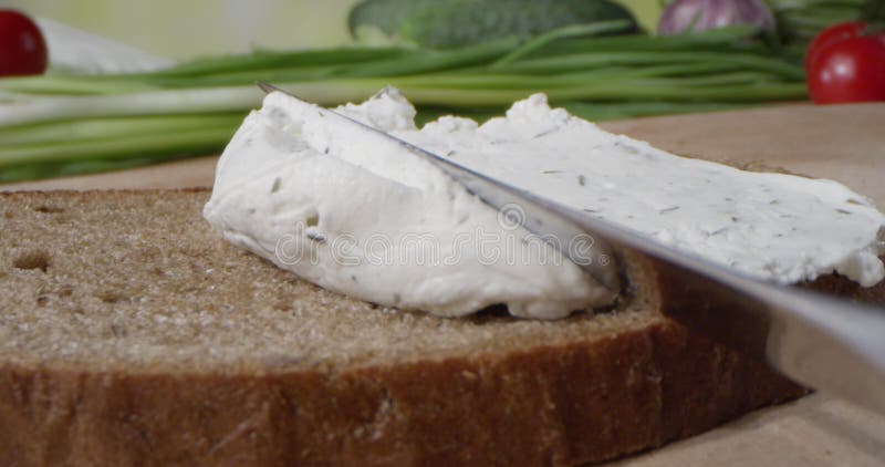 Creamy Textured Paste with Dill is Spreading on the Toast of Bread with ...