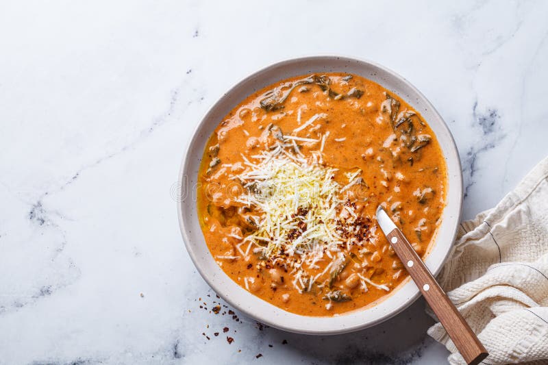 Creamy Tomato Bean Stew with Spinach and Cheese Stock Image - Image of ...