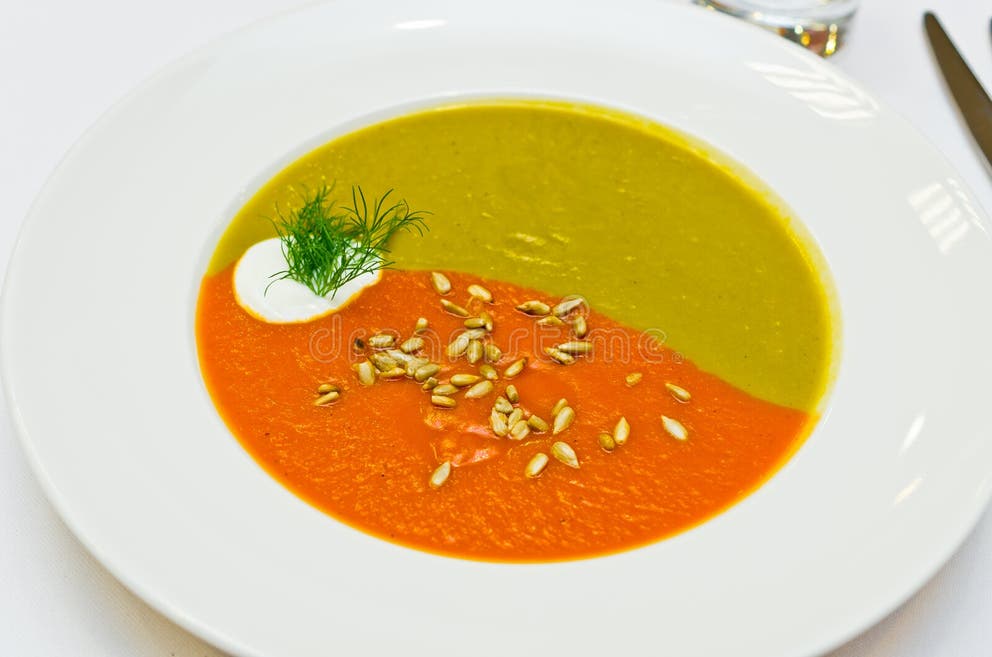 Creamy two colored soup stock photo. Image of broccoli - 28436114