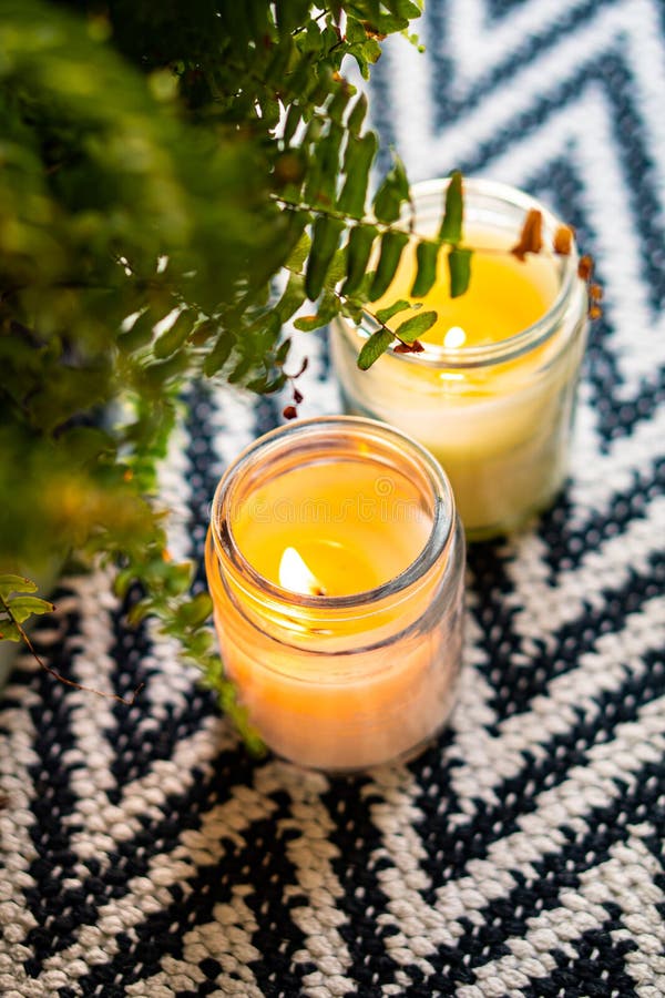 Create a Cozy Atmosphere with Rustic Candles, Greenery, and a Patterned ...