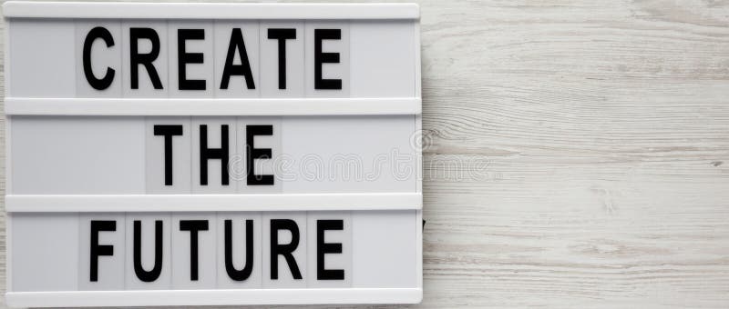`Create the Future` Word on Modern Board on a White Wooden Background ...
