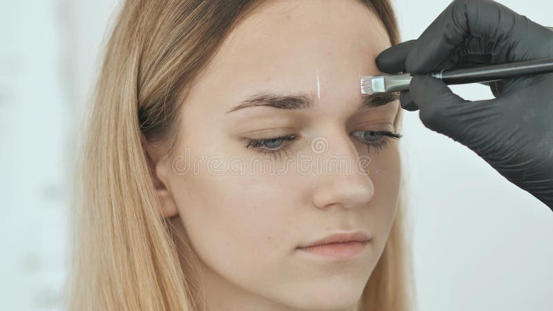 Create Permanent Eyebrow Makeup. Marking the Shape of the Eyebrows ...