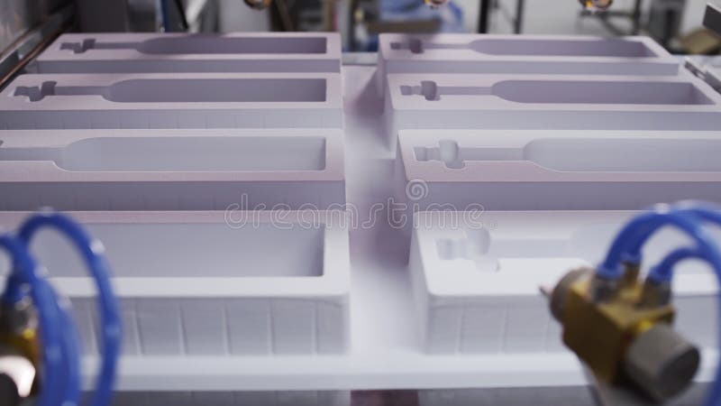 Machines Create Packing for Bottles. Process of Manufacturing Plastic ...