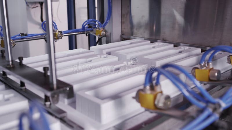 Machines Create Packing for Bottles. Process of Manufacturing Plastic ...