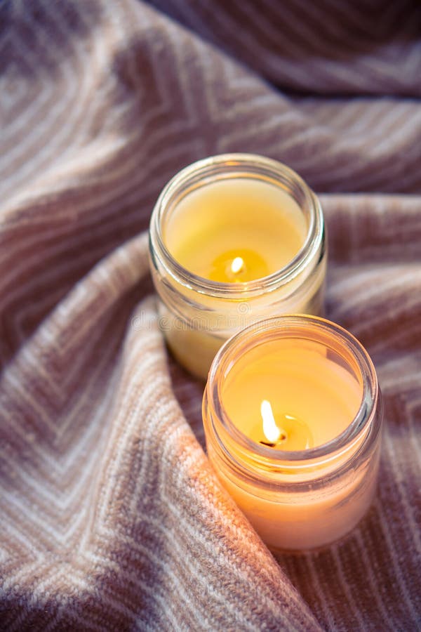 Create a Soothing Atmosphere with Cozy Candles on a Soft Fabric ...