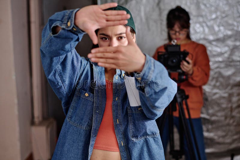 Creating Artistic Frame Using Hands in Indoor Studio Stock Photo ...