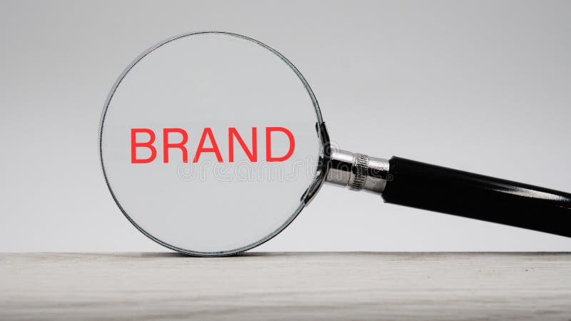Creating a Brand Concept. Brand Search Using a Magnifying Glass Stock ...