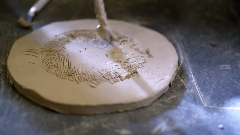 Artisan Clay Craft Making Impressions and Design Patterns on Wet Clay ...