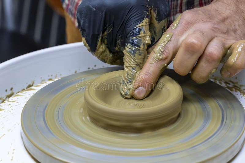 Creating a Ceramic Bowl in a Pottery Class. Wheel Throwing Stock Image ...