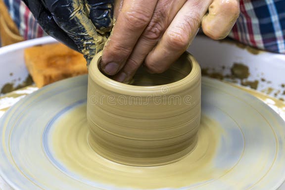 Creating a Ceramic Bowl in a Pottery Class. Wheel Throwing Stock Photo ...