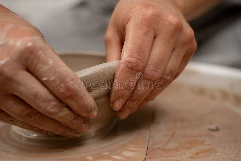 Creating a Ceramic Bowl by Yourself in a Pottery Class. Wheel Throwing ...