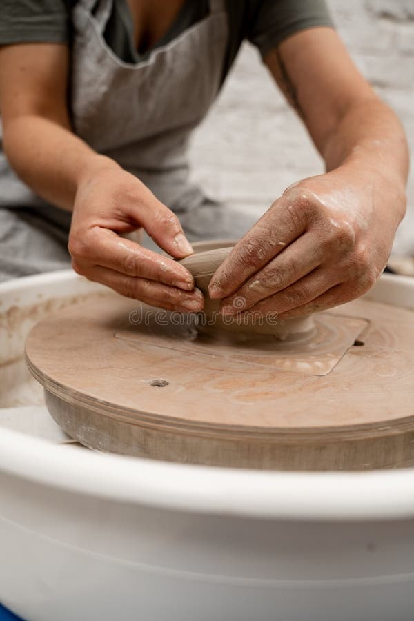 Creating a Ceramic Bowl by Yourself in a Pottery Class. Wheel Throwing ...