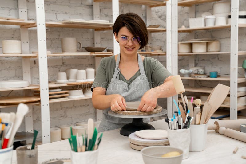 Creating Ceramic Products from Flat Sheets of Clay. Using Hands To ...
