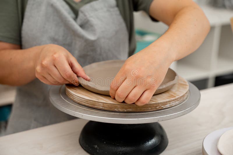 Creating Ceramic Products from Flat Sheets of Clay. Using Hands To ...