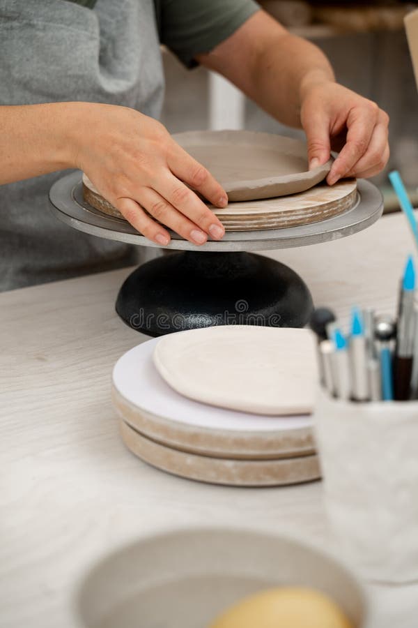 Creating Ceramic Products from Flat Sheets of Clay. Using Hands To ...