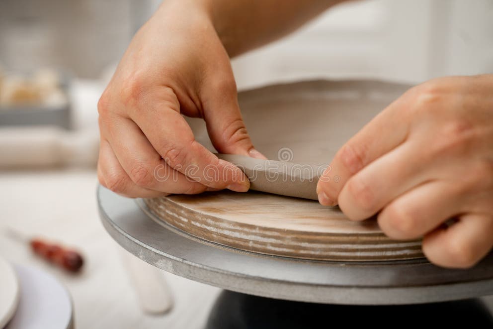 Creating Ceramic Products from Flat Sheets of Clay. Using Hands To ...
