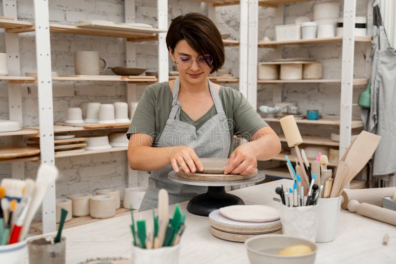 Creating Ceramic Products from Flat Sheets of Clay. Using Hands To ...