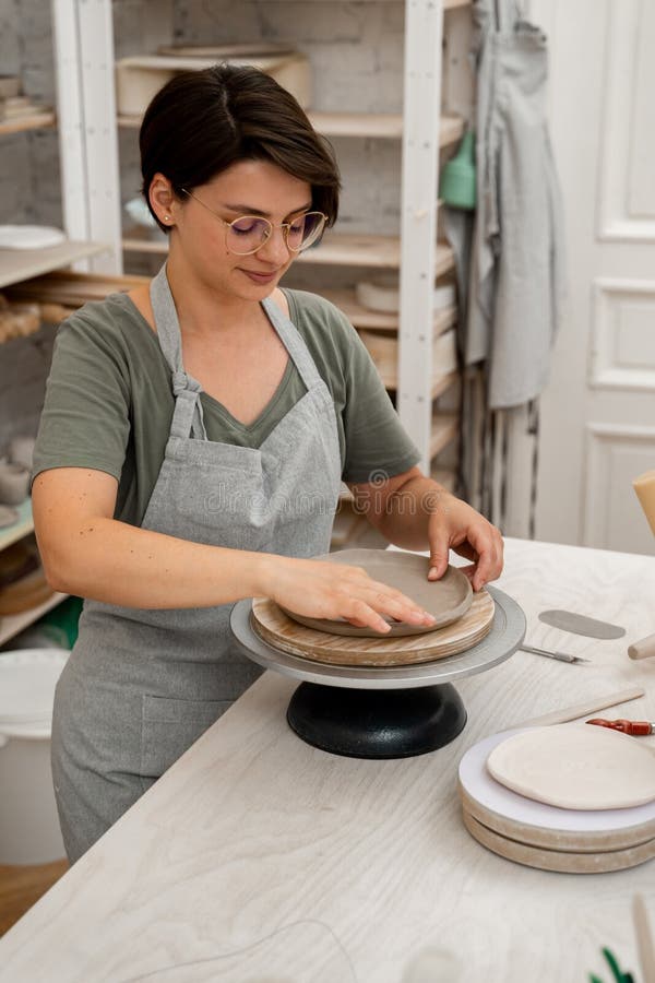 Creating Ceramic Products from Flat Sheets of Clay. Using Hands To ...