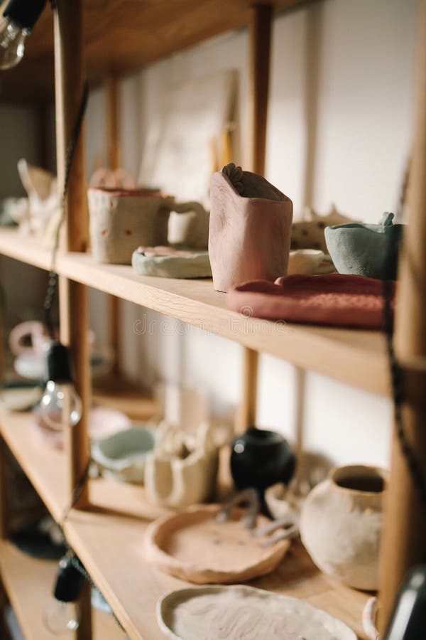 Creating Ceramics Ware with Own Hands. Shelf with Handmade Clay Cups ...