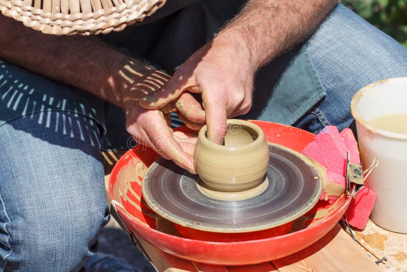 Creating Clay Jar by Hands with Potter Wheel Stock Photo - Image of ...