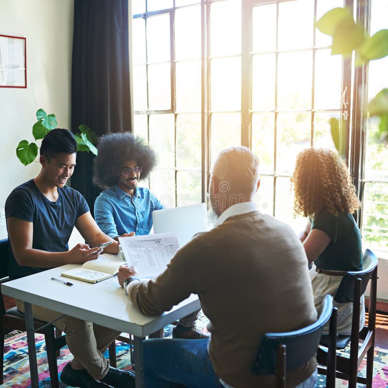 Creating Concepts that Work. a Group of Designers Having a Meeting in ...