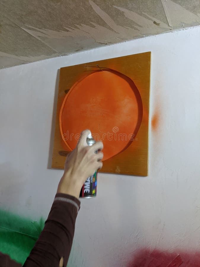 Creating a Creative Wall in an Apartment Using Spray Paint Stock Photo ...