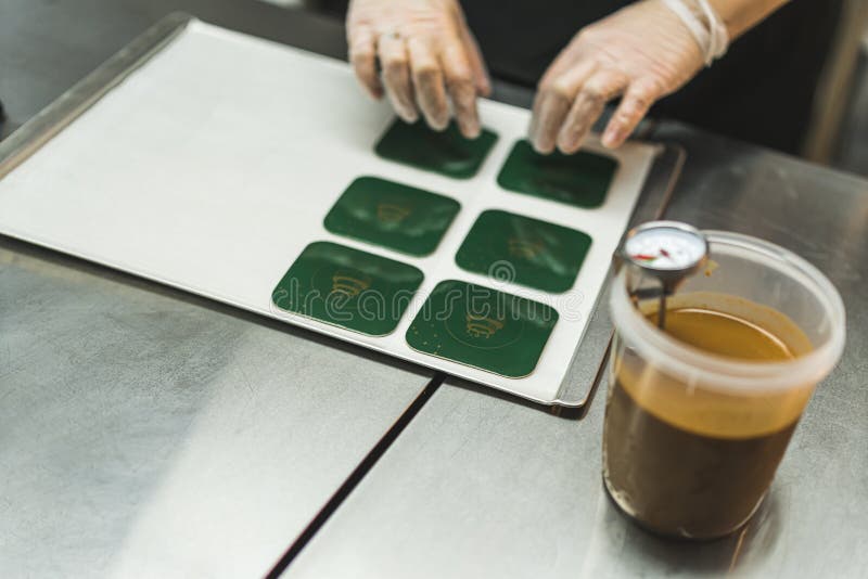 Creating a Dessert, Chef Preparing a Tray for Cakes and Caramel in ...