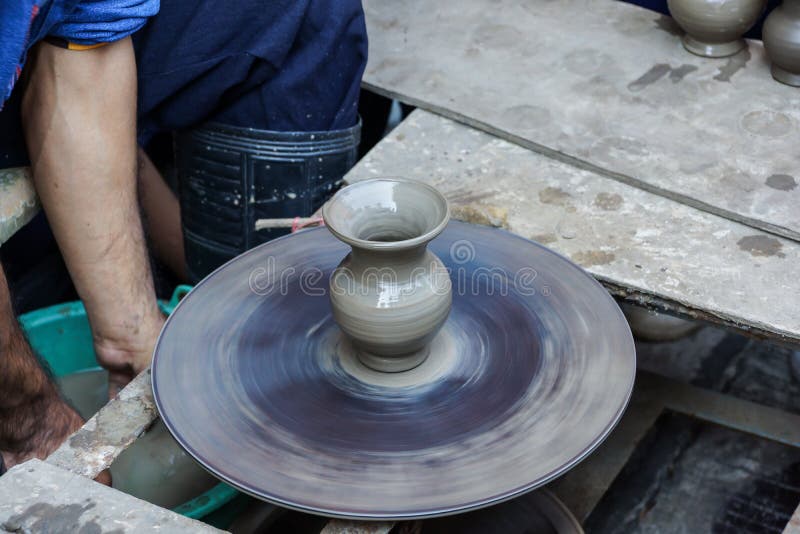 Creating an Earthen Jar on the Circle Stock Image - Image of clay, hand ...