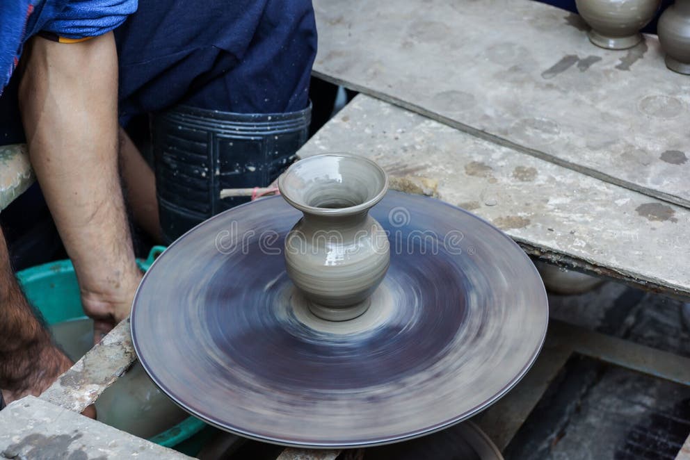 Creating an Earthen Jar on the Circle Stock Image - Image of clay, hand ...