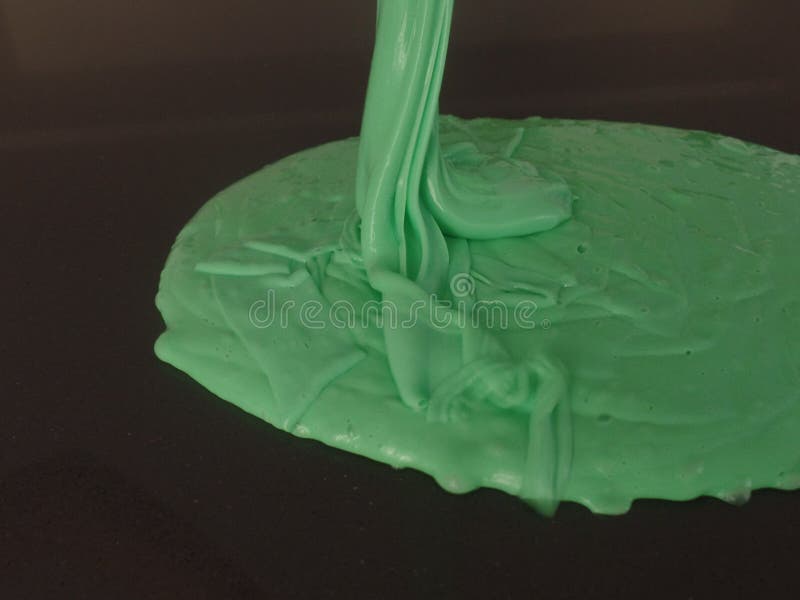 Creating Patterns Out of Bright Green Slime Stock Image - Image of ...