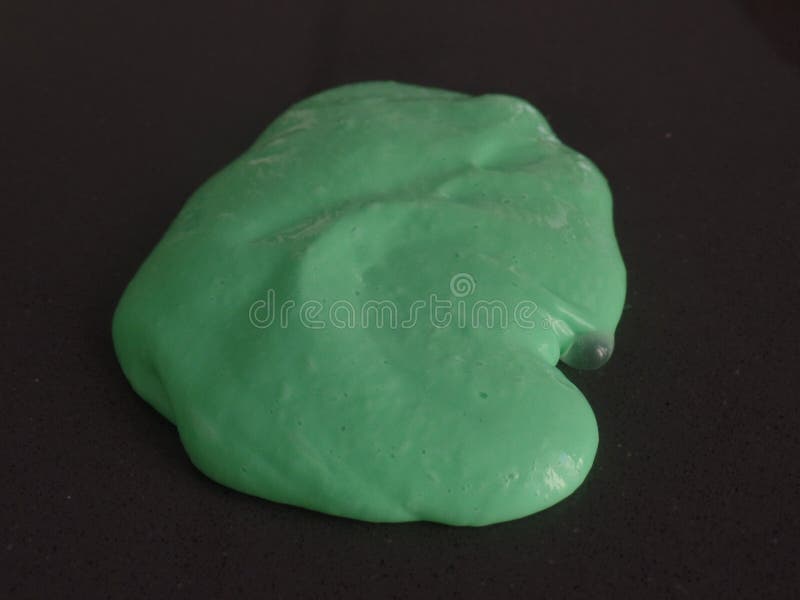 Creating Patterns Out of Bright Green Slime Stock Photo - Image of ...