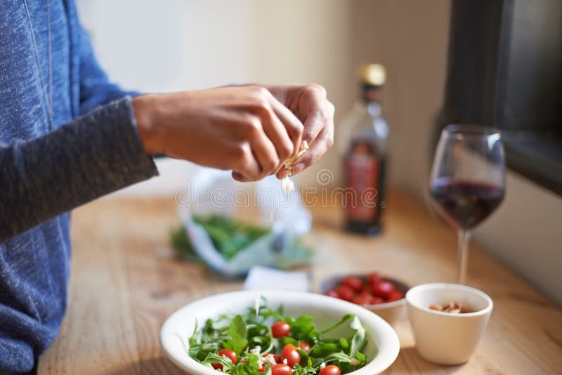 Creating the Perfect Lunch. a Young Woman Making a Salad in Her Kitchen ...