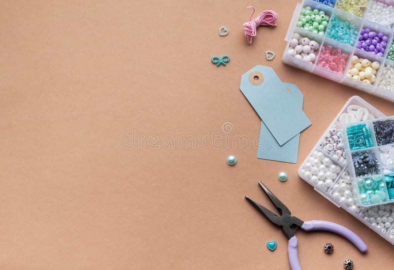 Creating Personalized Crafts with Beads and Tags on a Light Background ...