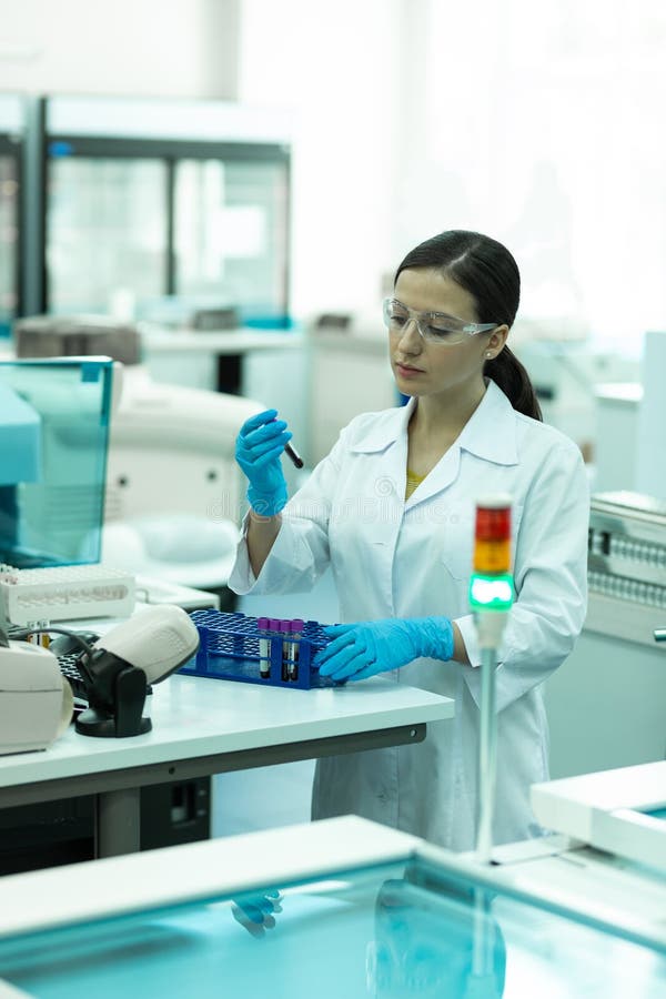 Serious Pharmacist Doing Chemical Experiment in Lab Stock Image - Image ...
