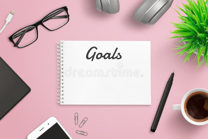 Creating Plan of Business Goals Concept on Pink Work Desk Stock Photo ...