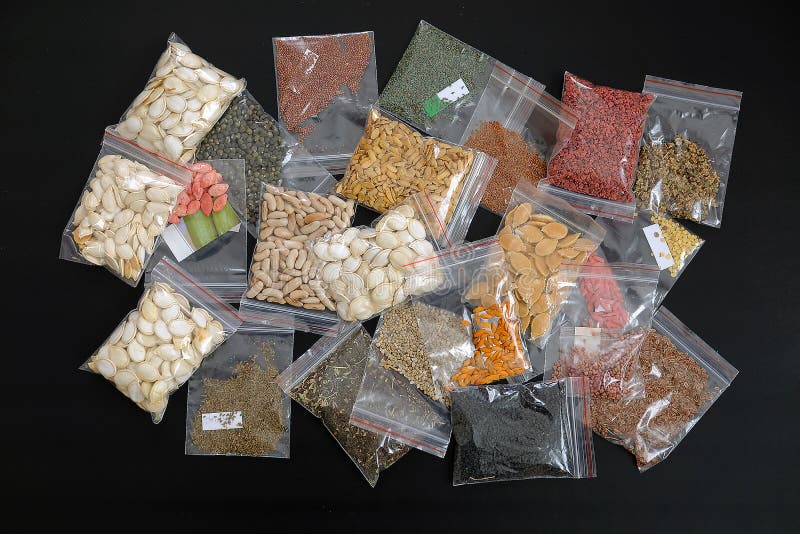 Organic Seeds Packed in a Wide Variety on Black Ground Stock Image ...
