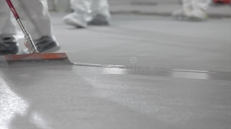 Creation of a Cement Polymer Floor. Builders Make a Polymer Floor in ...
