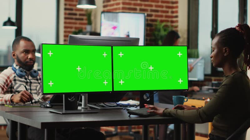 Creative Agency Employee Using Greenscreen Display on Computer Stock ...
