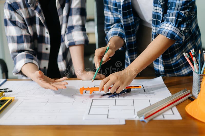 Creative Architect Projecting on the Big Drawings with Architectural ...