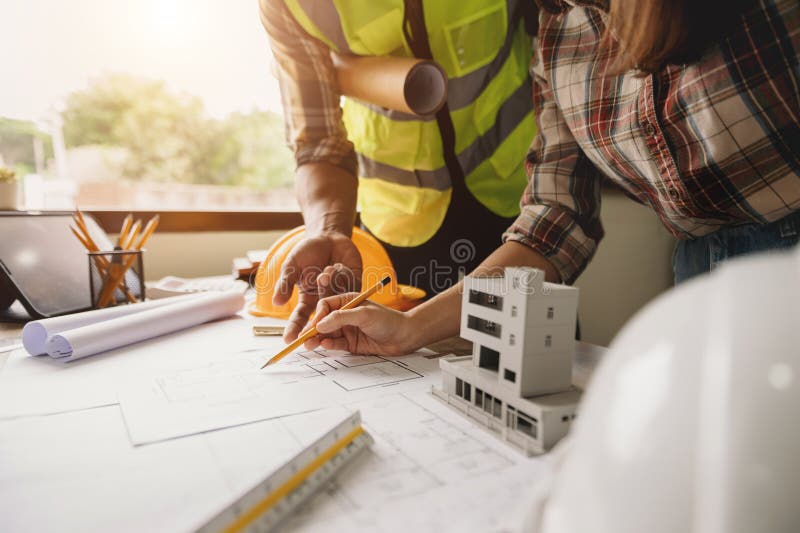 Creative Architect Projecting on the Big Drawings in the Dark Loft ...