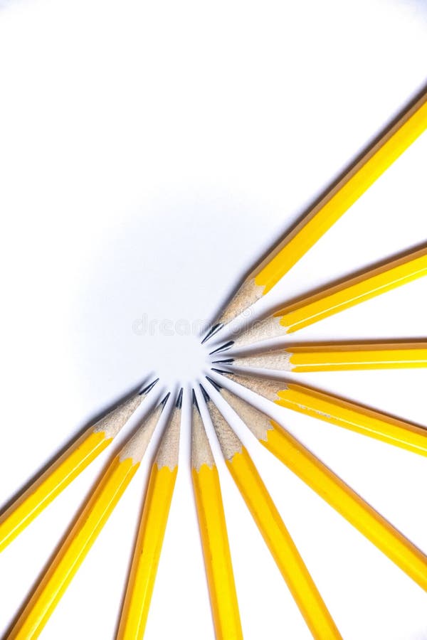 Creative Arrangement of Yellow Pencils Forming a Circular Pattern on a ...