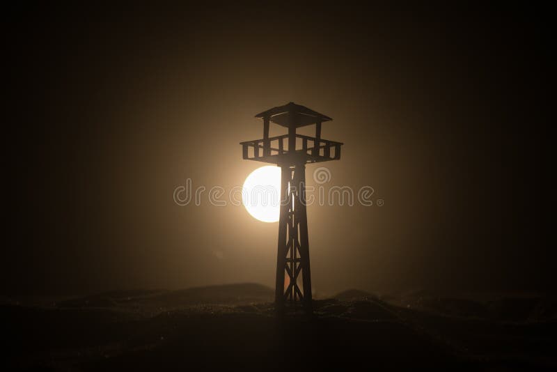 Creative Artwork Decoration. Silhouette of Army Watchtower at Night ...