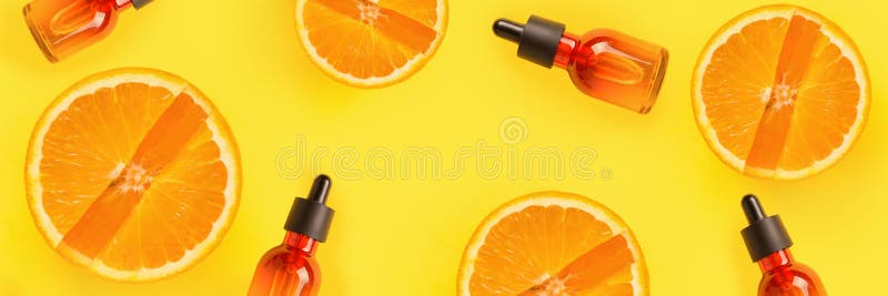 Creative Background Vitamin C, with Slices Orange, Bottle with Serum on ...
