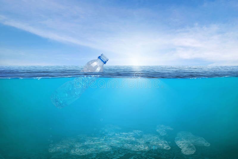 Creative Background, Plastic Bottle Floating in the Ocean, a Bottle in ...
