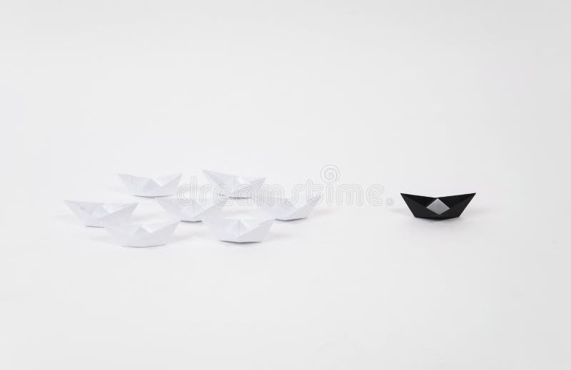 Creative Black Paper Ship among White. Concept Different Stock Image ...