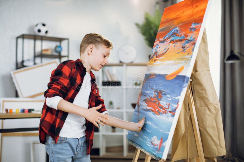 Creative Boy Drawing with Hands on Canvas at Studio Stock Photo - Image ...