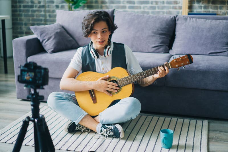 Creative Boy Recording Tutorial about Guitar for Online Vlog Talking ...