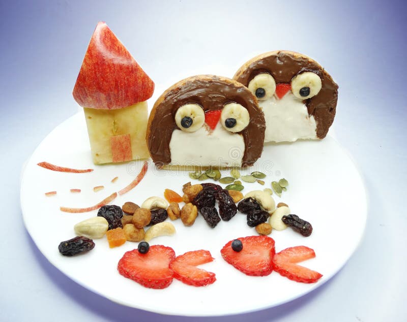 Creative Breakfast with Fruit and Sweet Chocolate Creme on Bread Stock ...