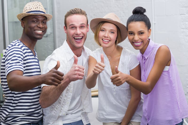 Creative Business People Gesturing Thumbs Up Stock Photo - Image of ...